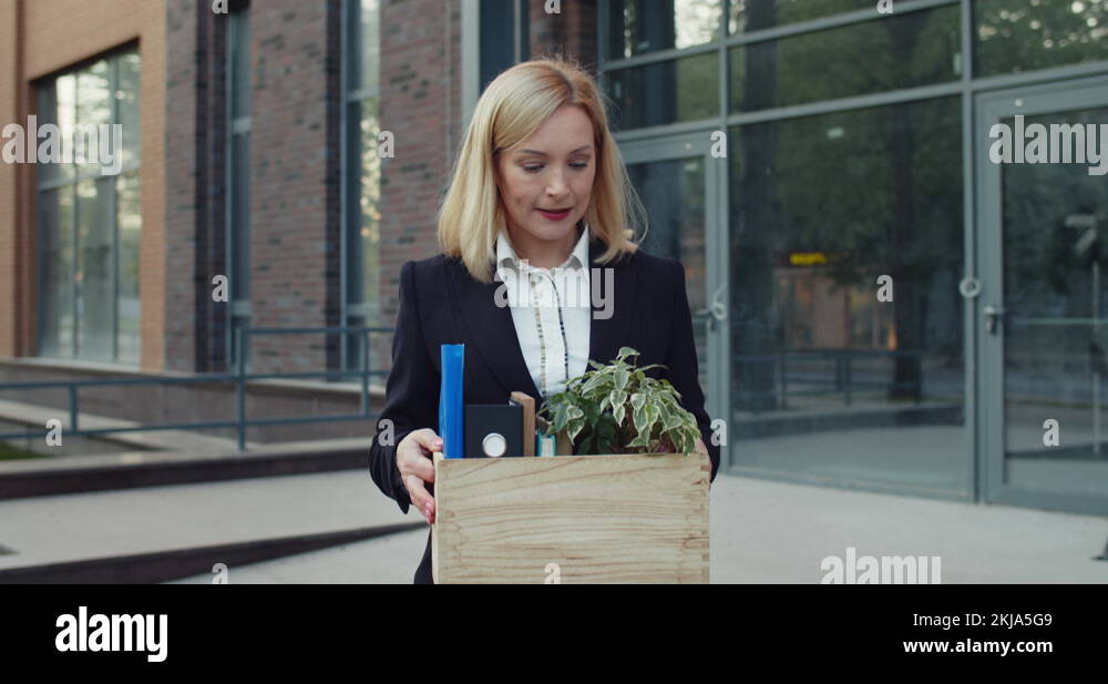 Angry woman in 30s muttering and scolding her employers while walking ...