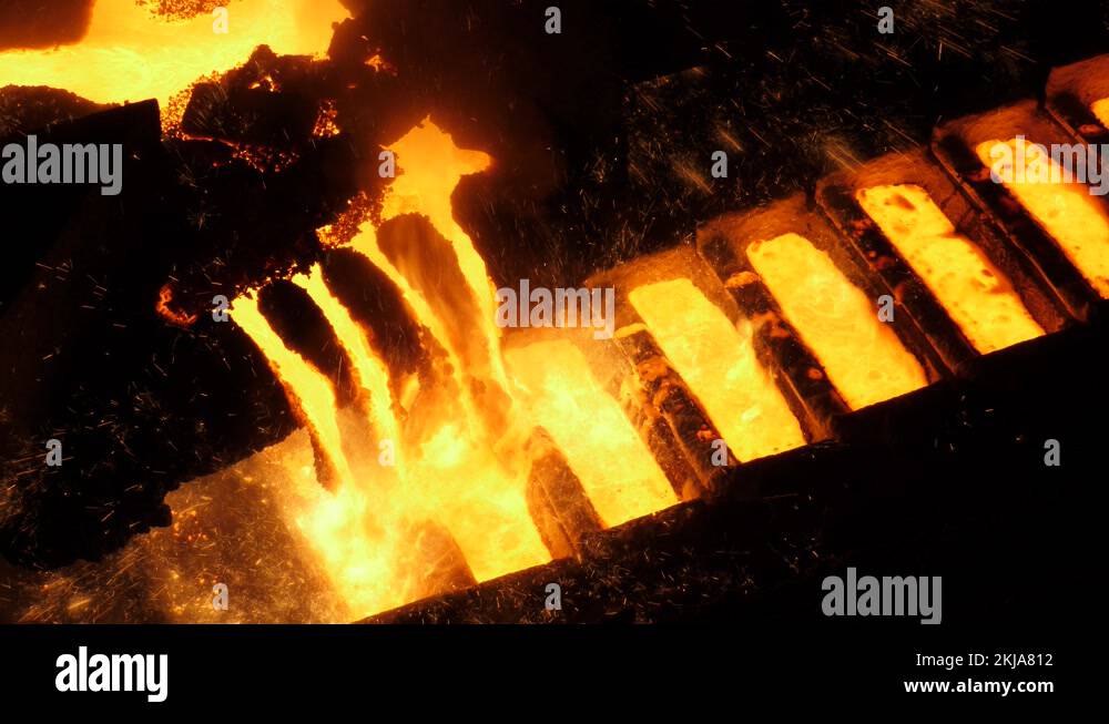 The high-temperature molten iron in the smelting plant sparks during ...