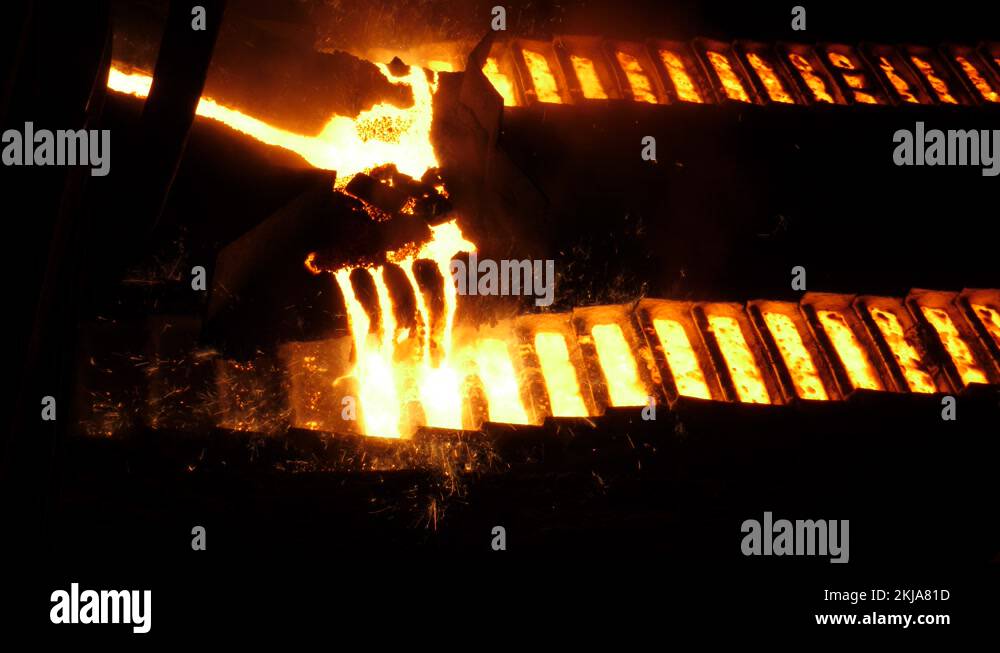 The high-temperature molten iron in the smelting plant sparks during ...