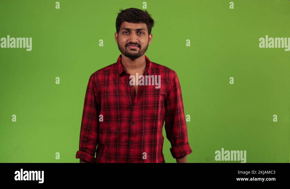 Young happy indian man waving hand Stock Video Footage - Alamy