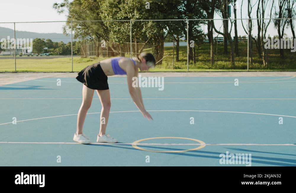 Young Woman Makes Shapes with Legs in Straddle Handstand. Wide Profile ...