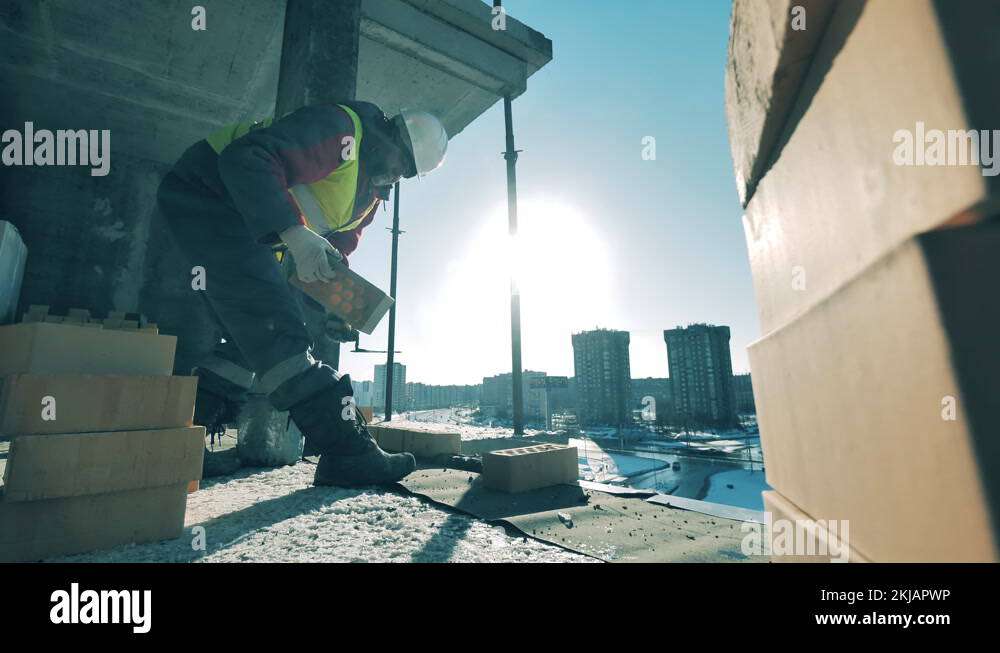 Man lays bricks in Stock Videos & Footage - HD and 4K Video Clips - Alamy