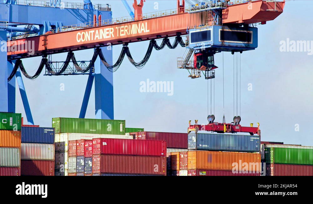 Dock crane unloading a container ship Stock Videos & Footage - HD and ...