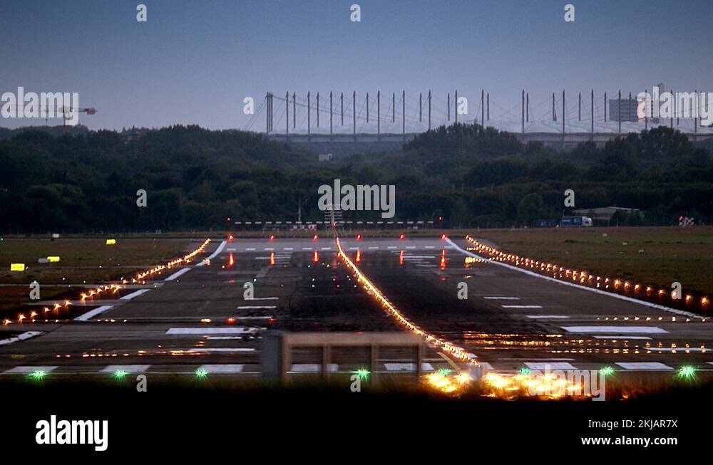 Boeing 777 is landing at HAM Airport at dawn Stock Video Footage - Alamy