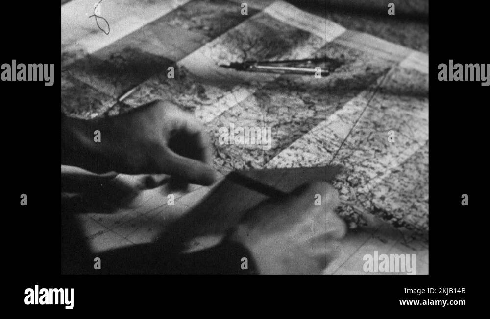 Mans hand pointing at locations at map, using ruler, drawing track for ...
