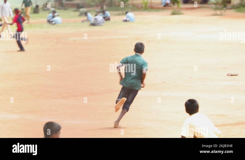 School children playing on a school playground in Karnataka, India ...