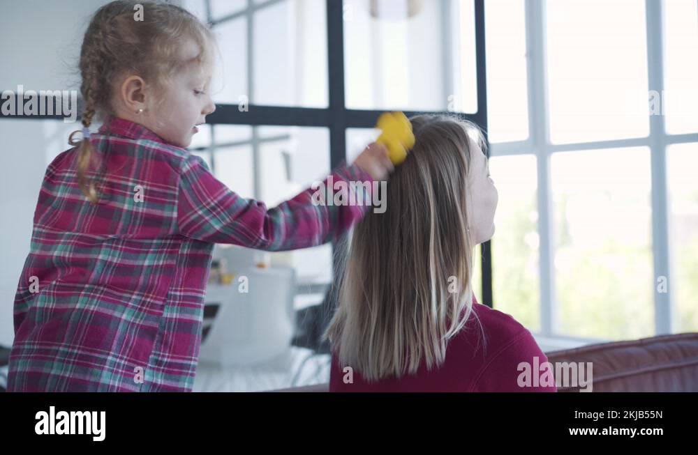 Woman combing toy Stock Videos & Footage - HD and 4K Video Clips - Alamy