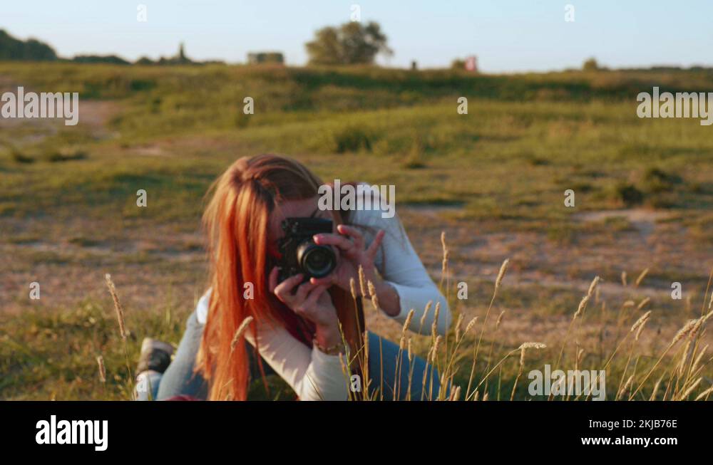 Woman kneeling with camera Stock Videos & Footage - HD and 4K Video ...