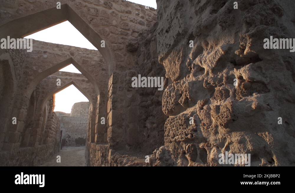 Dollying in and panning through the ancient arches of the Bahrain fort ...