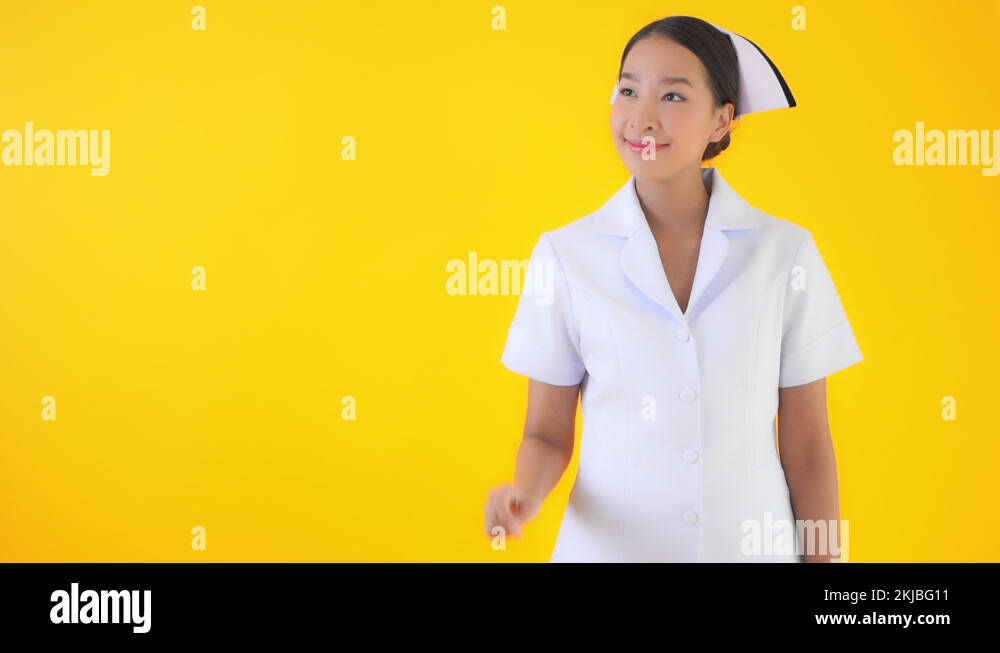 A Woman Dressed As A Nurse In Traditional Uniform And Nurses Cap Raises Stock Video Footage