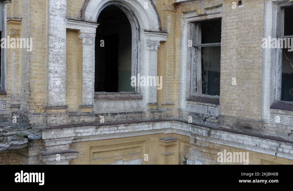 Broken windows of an abandoned old manor house (mansion house). Haunted ...