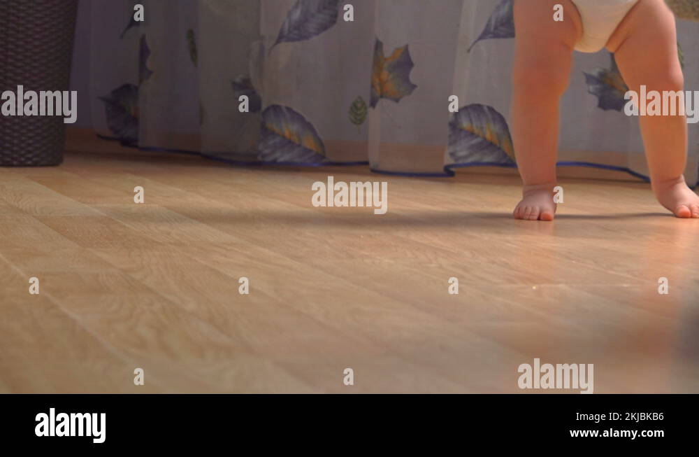 Baby taking its first steps Stock Videos & Footage - HD and 4K Video ...