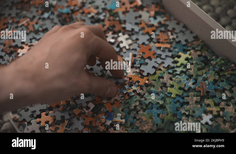 Piece of a puzzle Stock Videos & Footage - HD and 4K Video Clips - Alamy