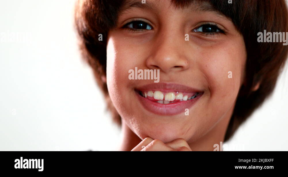 Handsome mixed race child portrait close-up, charismatic kid smile face ...