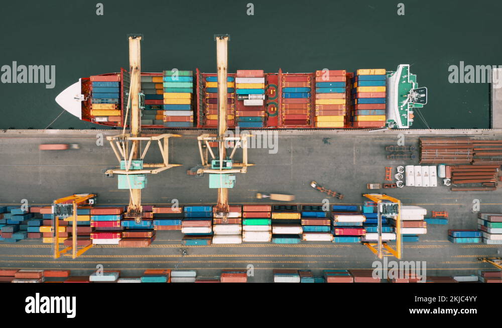 Loading Cargo Container Ship at Port Aerial Timelapse, Top Down View ...