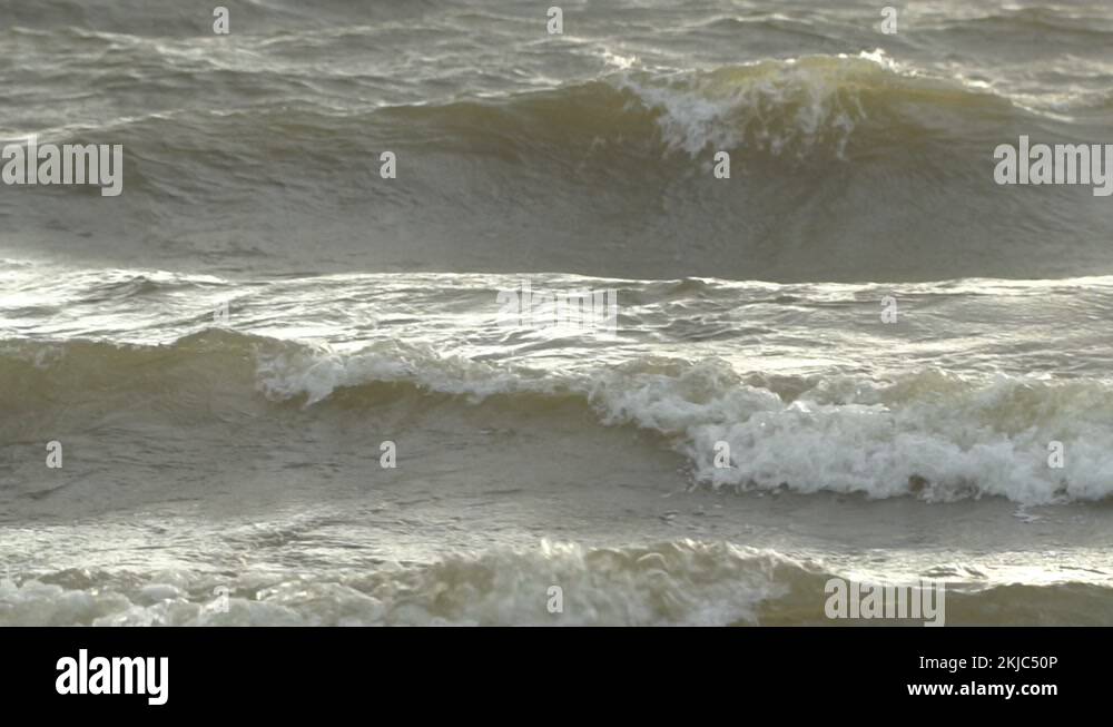 Slow motion waves with texture and wind spray, raw natural wonders ...