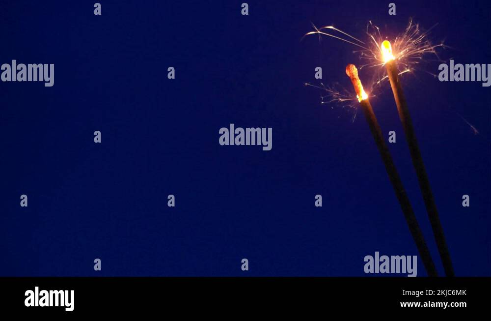 Two burning sparklers on blue Stock Videos & Footage - HD and 4K Video ...