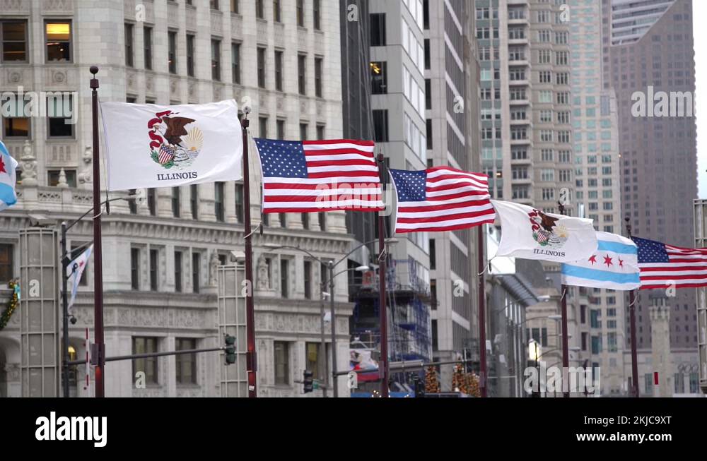 Slowly moving flags of Illinois, USA and Chicago. Flags flying in the ...