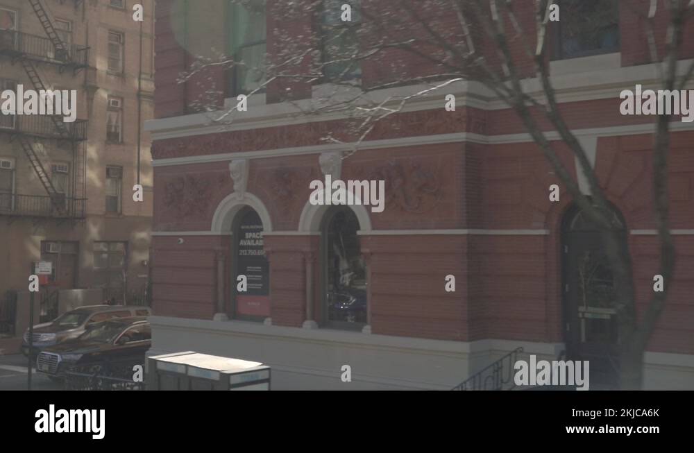 Quickly looking down a street in Manhattan, New York City, from a city ...