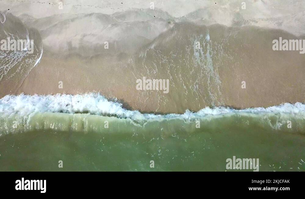 Blue ocean waves Sunlight Reflection and Sand Beach background. 4K ...