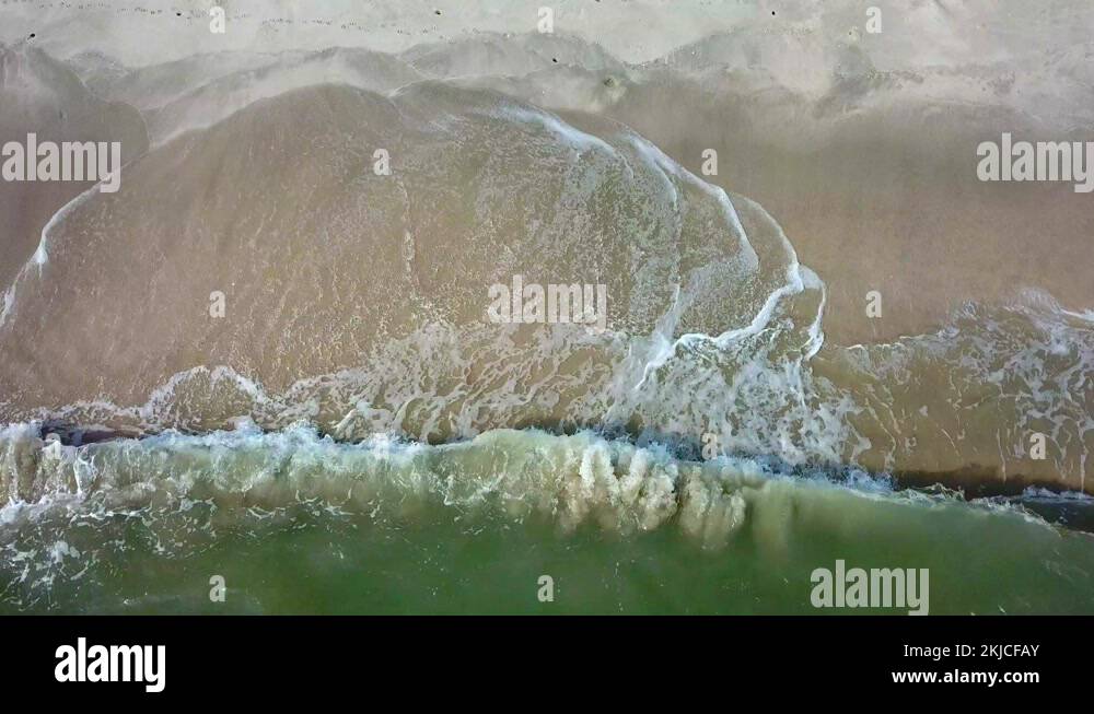 Blue ocean waves Sunlight Reflection and Sand Beach background. 4K ...