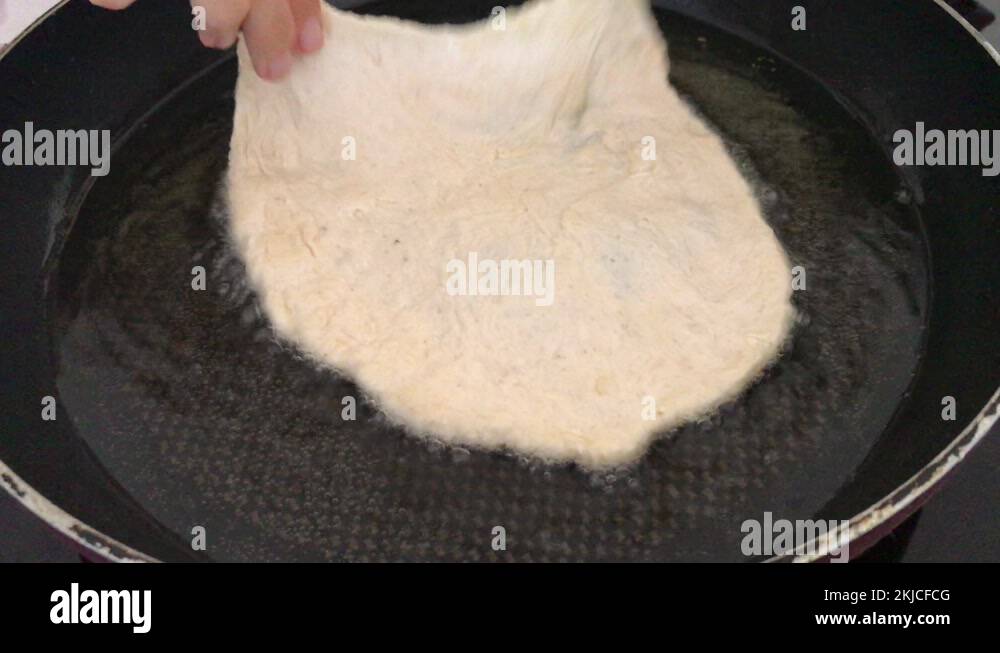 Deep fried flat bread Stock Videos & Footage - HD and 4K Video Clips ...