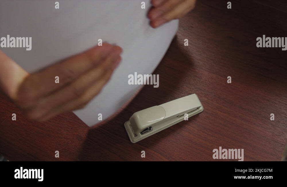 Stapler top Stock Videos & Footage - HD and 4K Video Clips - Alamy