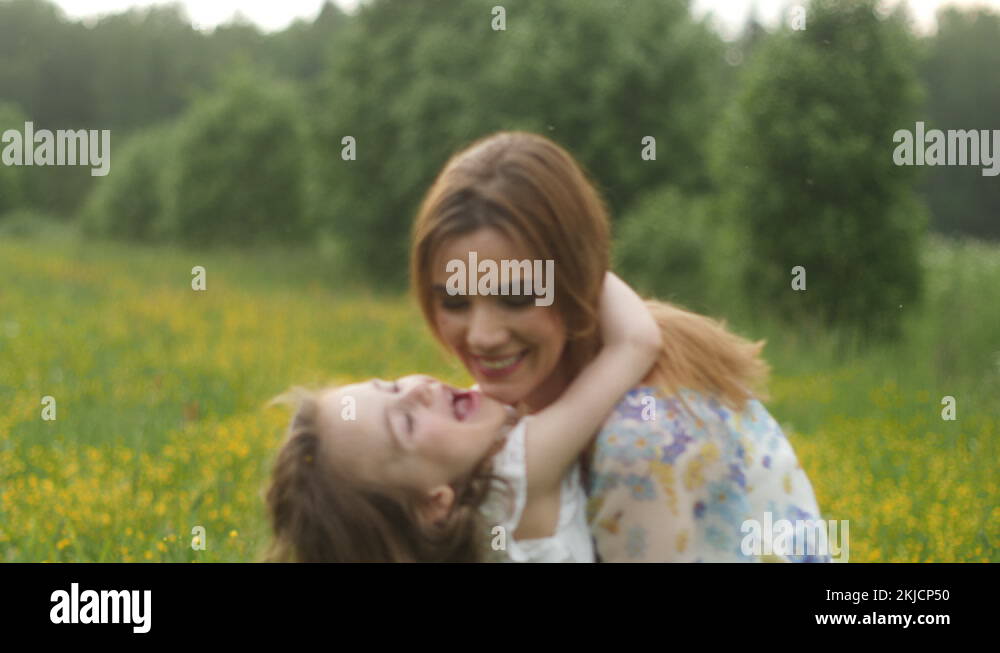 Mother daughter walk in yellow Stock Videos & Footage - HD and 4K Video ...