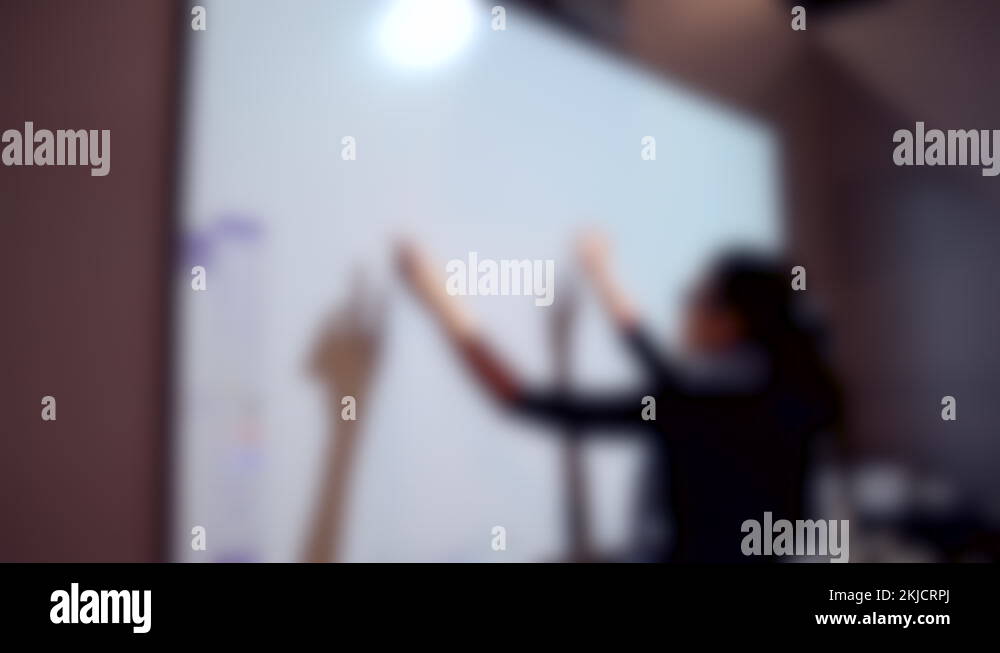 Blurred background. Drawing a finger or an object on a solid surface ...