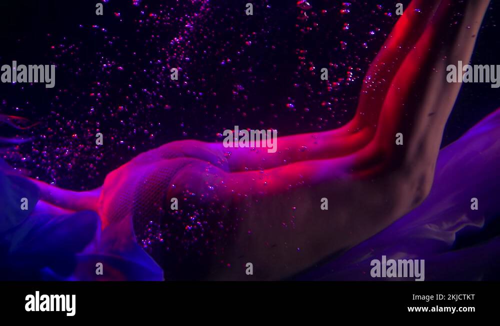 buttocks and slim legs of female swimmer underwater in swimming pool, subaquatic Stock Video ...