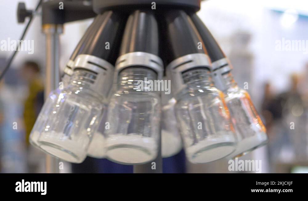 Rotary sample divider for analytical measurement of solid materials ...