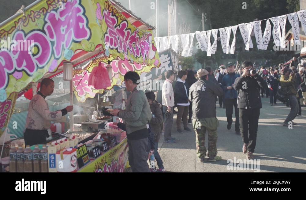Japanese Man Buying Food From A Yatai Food Vendor During The Teppo ...