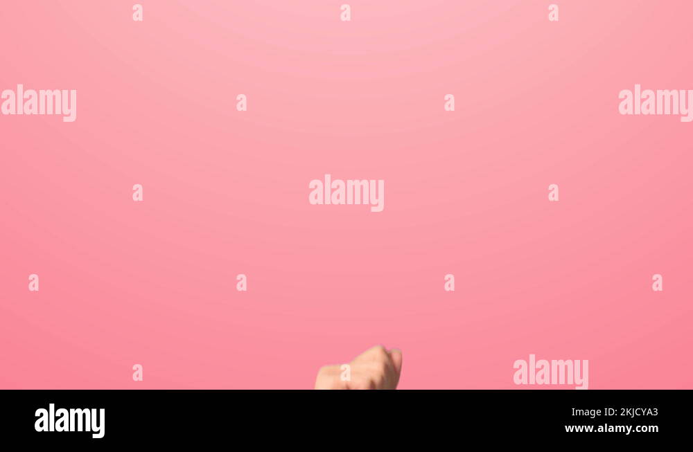 Click your fingers to change the background color. Pink background, a ...
