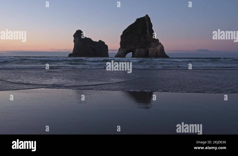 Wharariki beach archway islands Stock Videos & Footage - HD and 4K ...