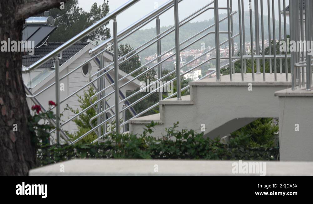 Zoom out stair railings and outdoor infinity pool Stock Video Footage ...