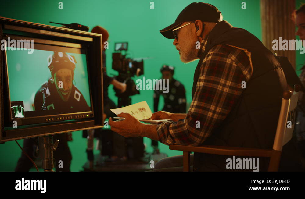 Director Looks at Display and Compares to Storyboard while Shooting ...