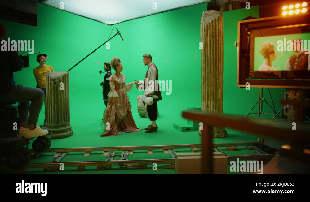 People Shooting Historic Drama Movie on Green Screen. Cameraman ...
