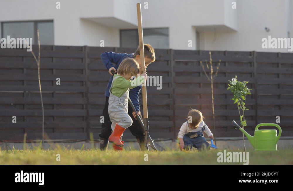 Children garden digging Stock Videos & Footage - HD and 4K Video Clips ...