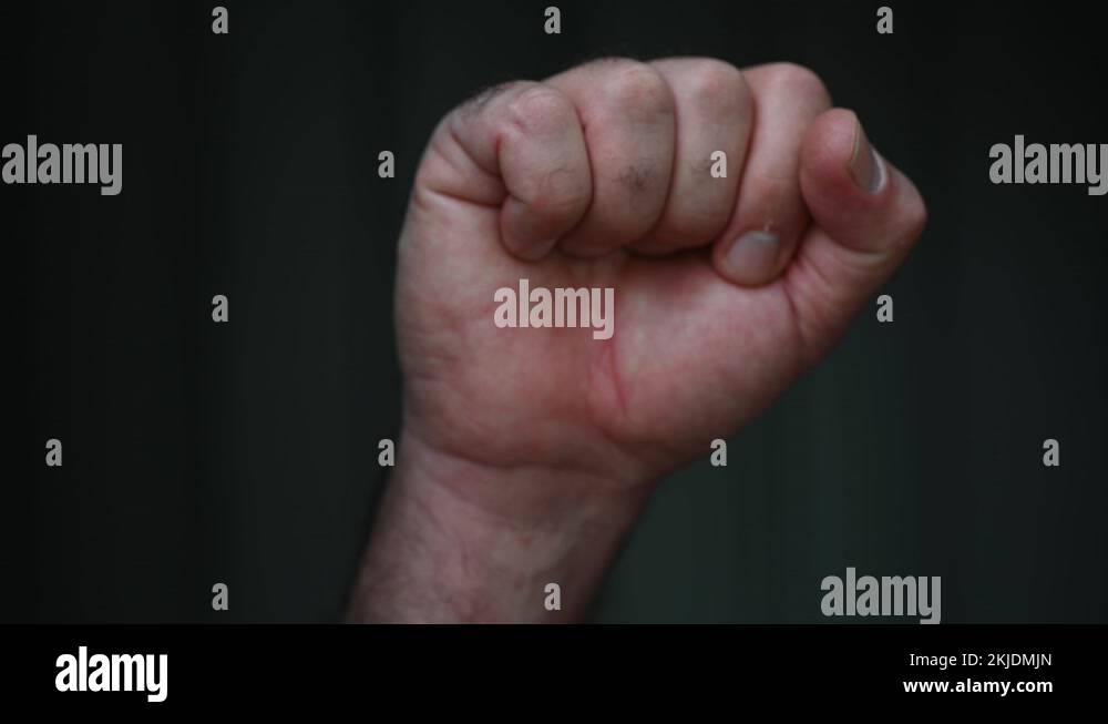 Raised fist symbol of solidarity and support Stock Video Footage - Alamy