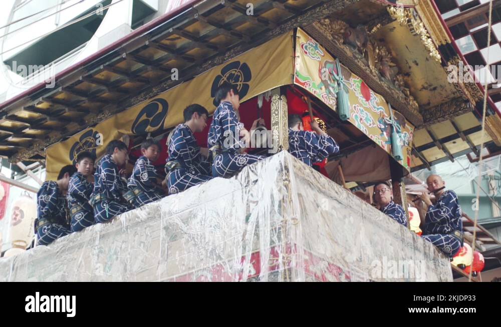 Japanese People Performing On The Float During Yoiyama At The Gion ...