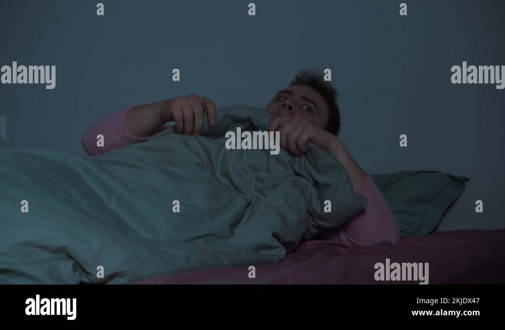 Young plump man with short hair cut wakes up suddenly at the middle of ... Young plump man with short hair cut wakes up suddenly at the middle of ...