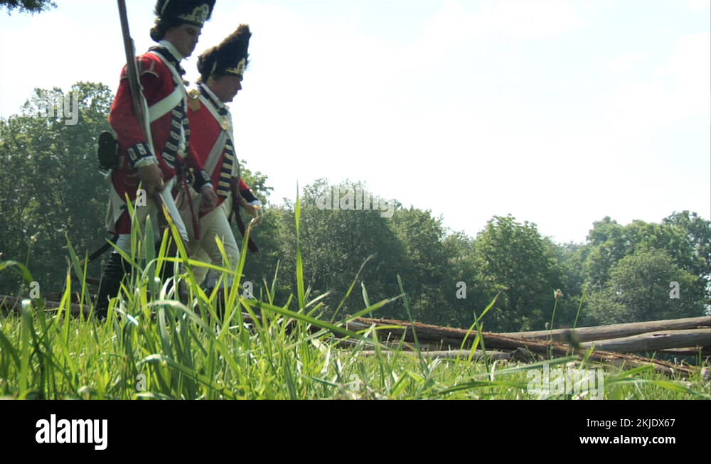British Army Redcoat Re-enactment Soldiers Marching with Muskets Stock ...
