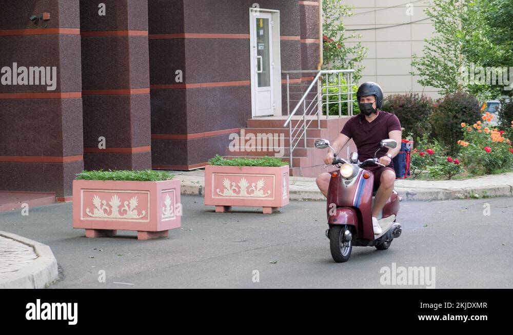 Express food delivery service. Delivery boy wearing red uniform on ...