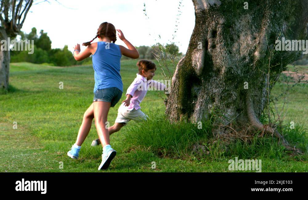 Two children playing running Stock Videos & Footage - HD and 4K Video ...