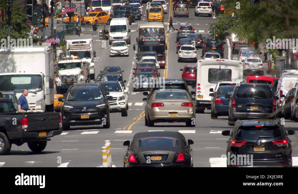 New York City heavy street traffic, dense road transportation, sunny ...