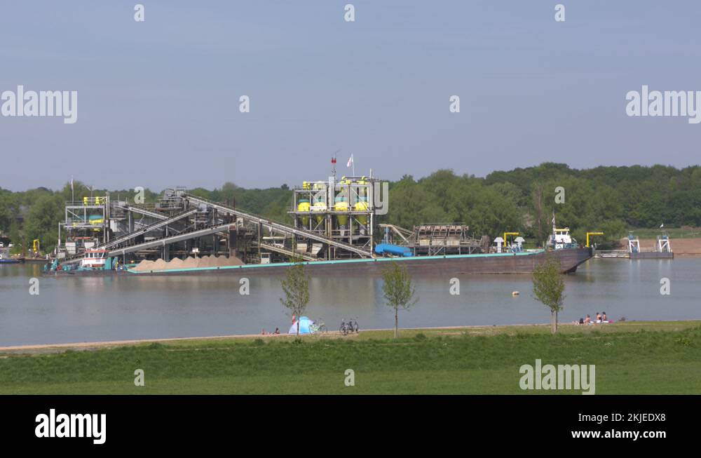 Sand mining along the river Rhine. Floating sand classification plant ...