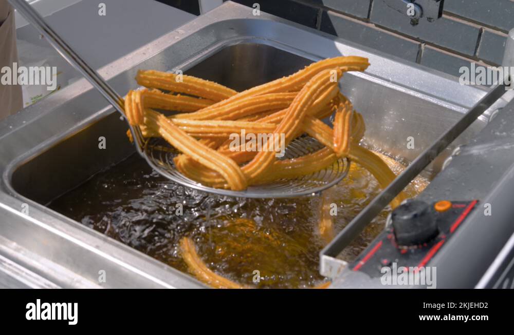Churros at the food market Stock Videos & Footage - HD and 4K Video ...