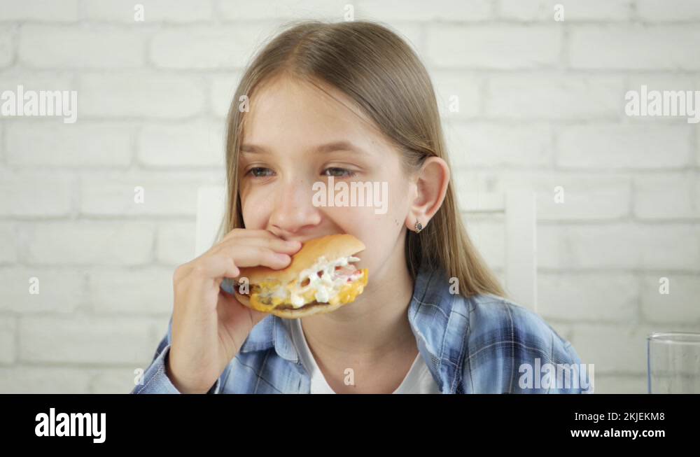 Kid Eating Fast Food, Child Eats Hamburger in Restaurant, Teenager Girl ...