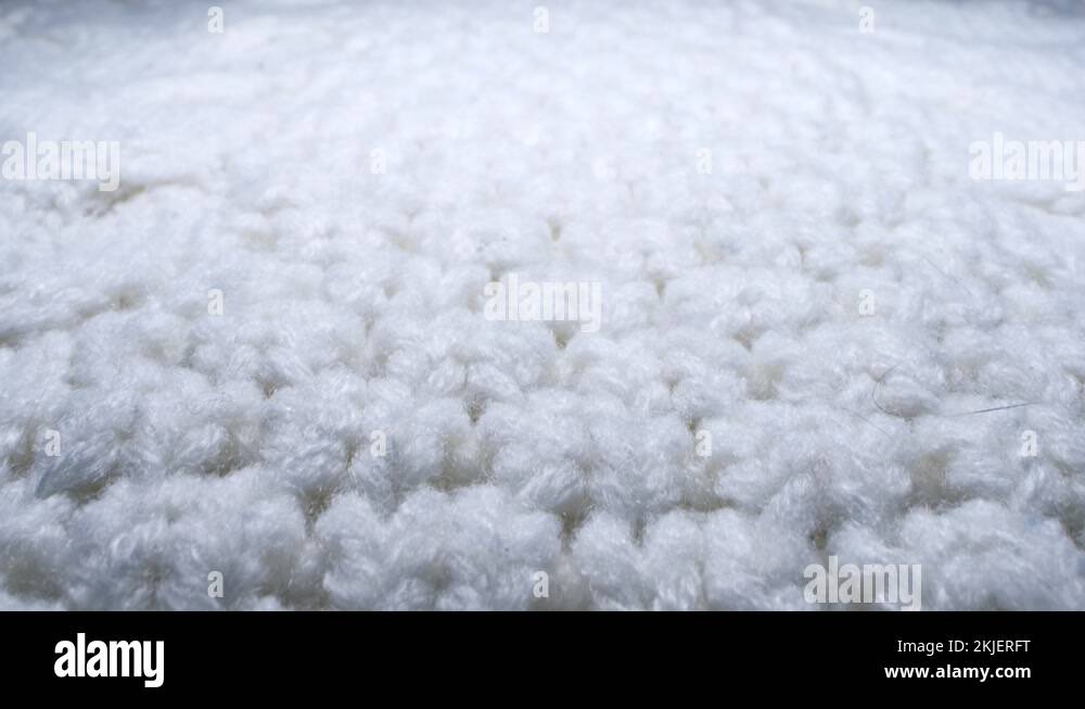 macro. textile background. white wool knit fabric texture Stock Video ...