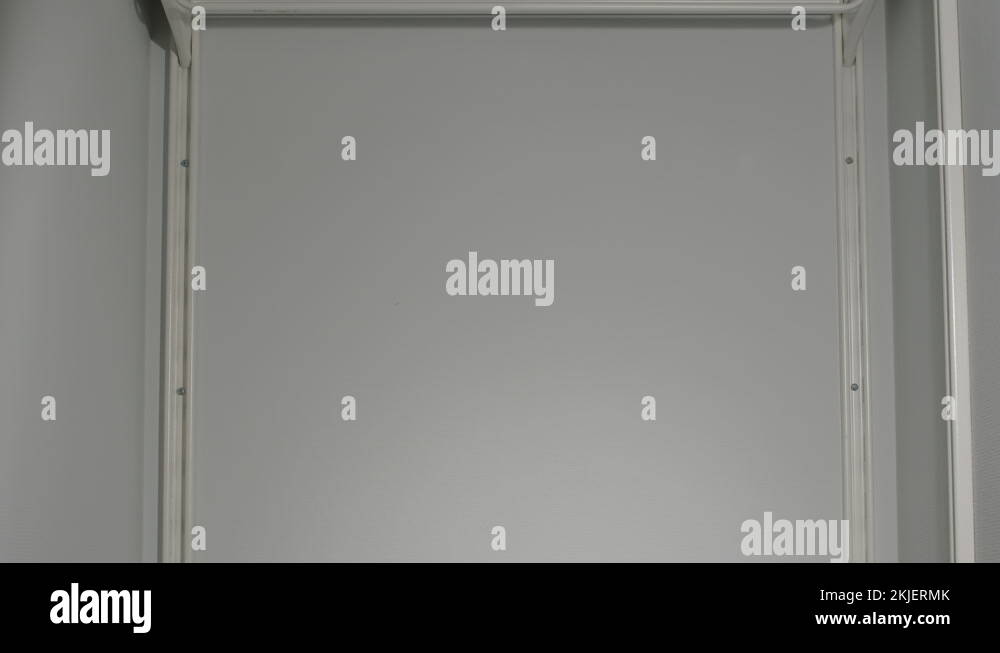 Wardrobe is filling with clothes at home. Stop Motion animation Stock ...